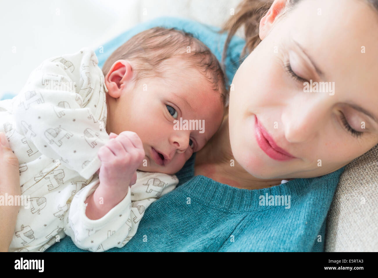 Mother and her two week old baby boy Stock Photo - Alamy