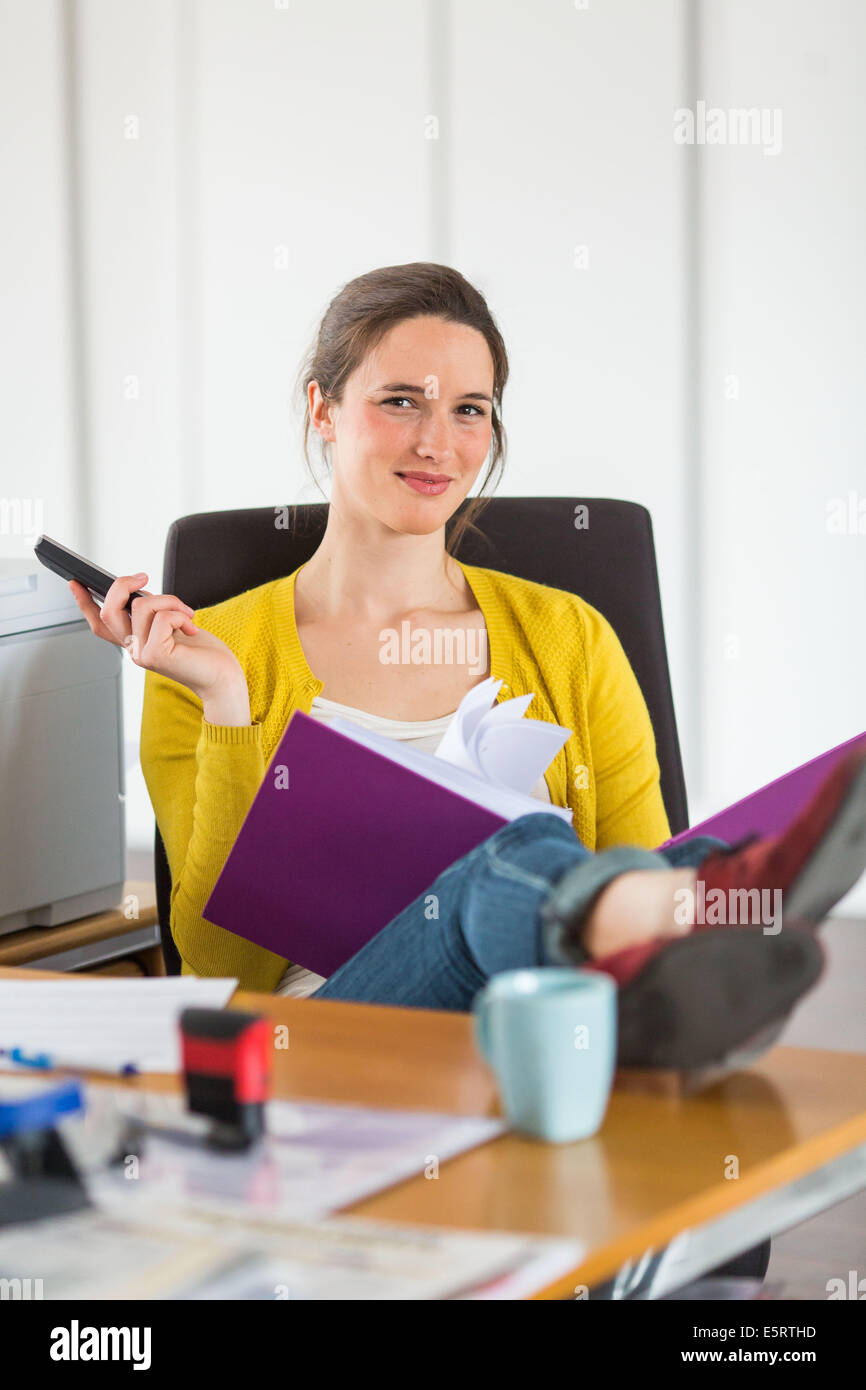 Office worker at desk Stock Photo - Alamy