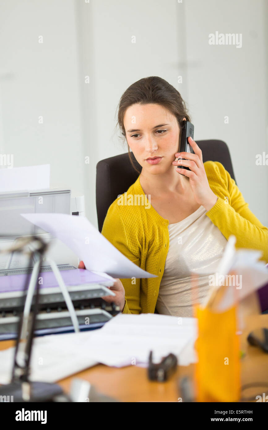 Office worker at desk Stock Photo - Alamy