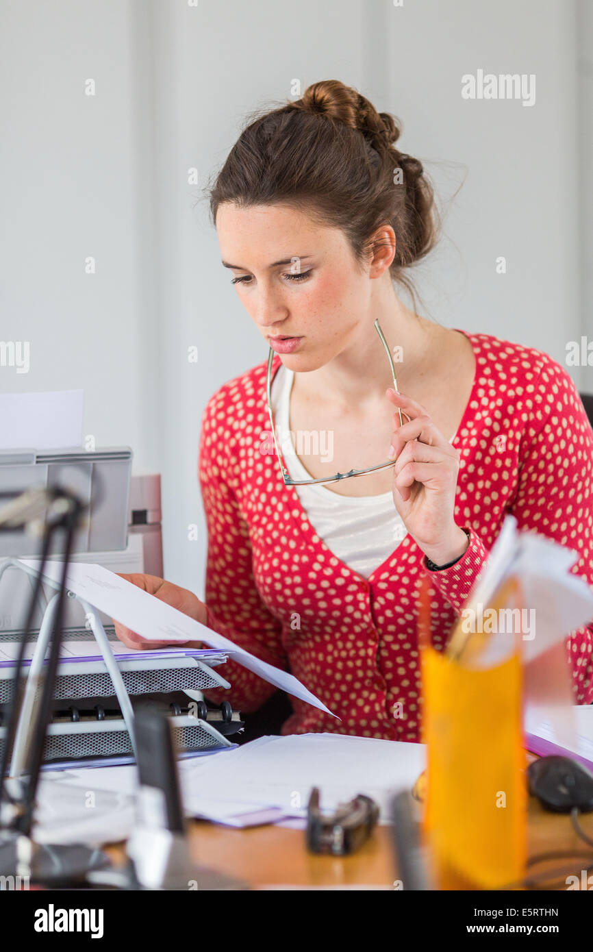 Office worker at desk Stock Photo - Alamy