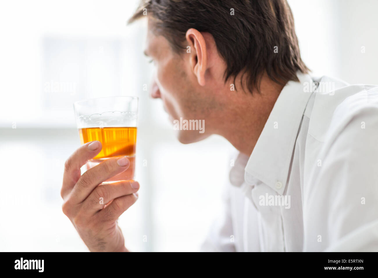 Man drinking Alcohol Stock Photo - Alamy
