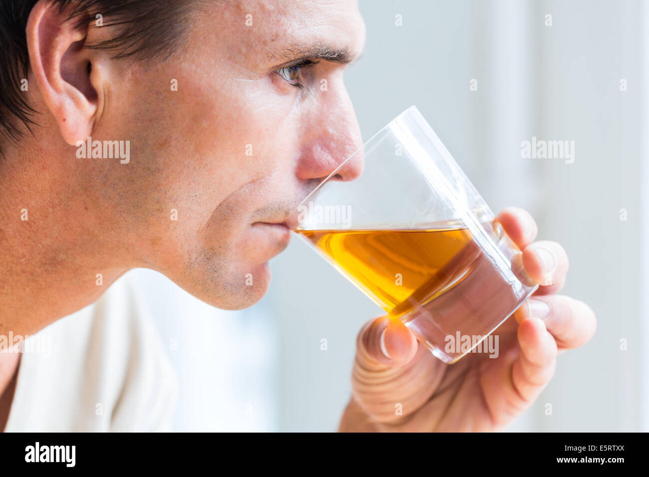 Man drinking Alcohol Stock Photo - Alamy
