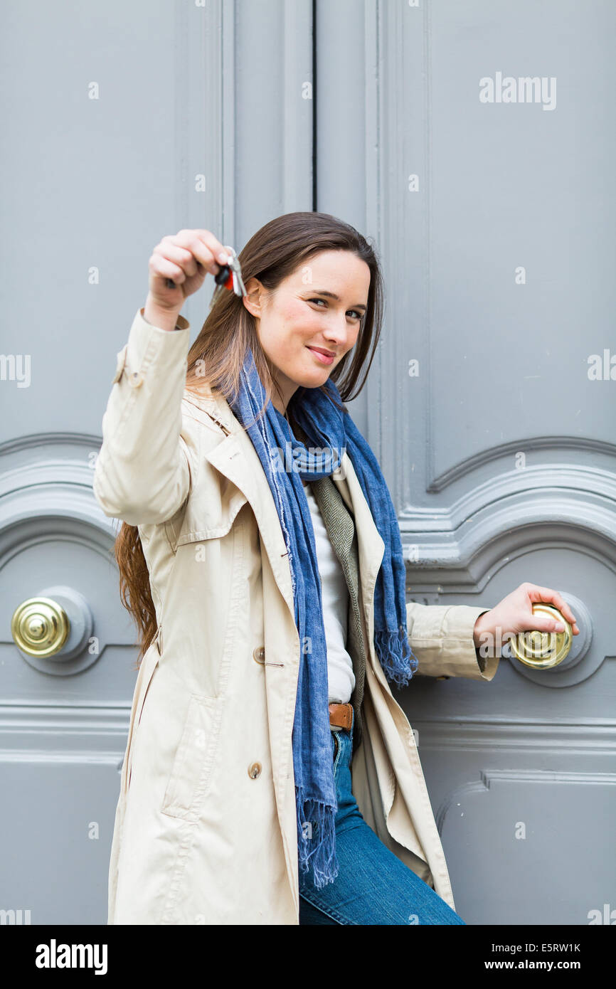 Happy woman with a keys Stock Photo - Alamy