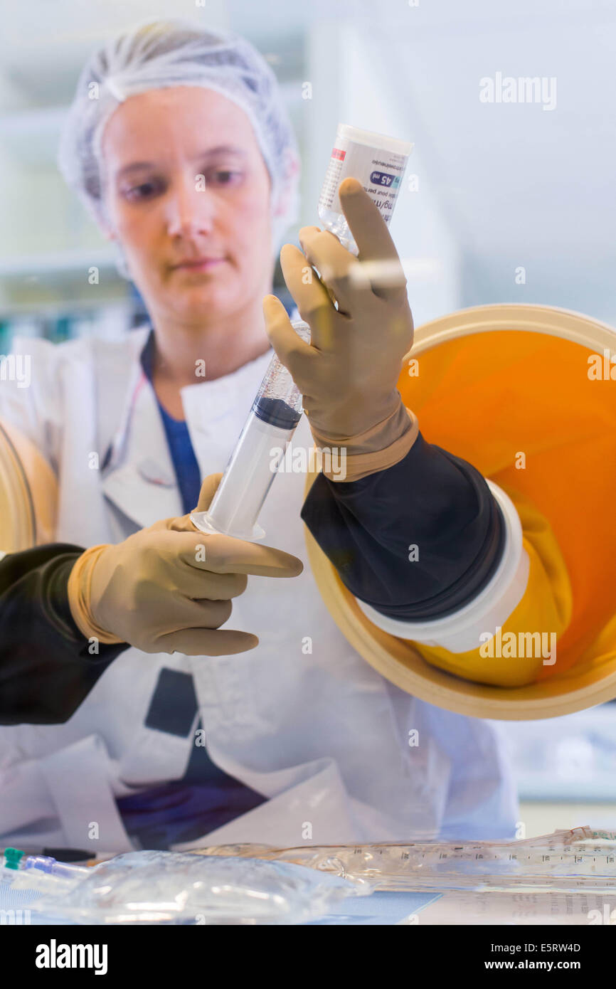 Compounder hi-res stock photography and images - Alamy