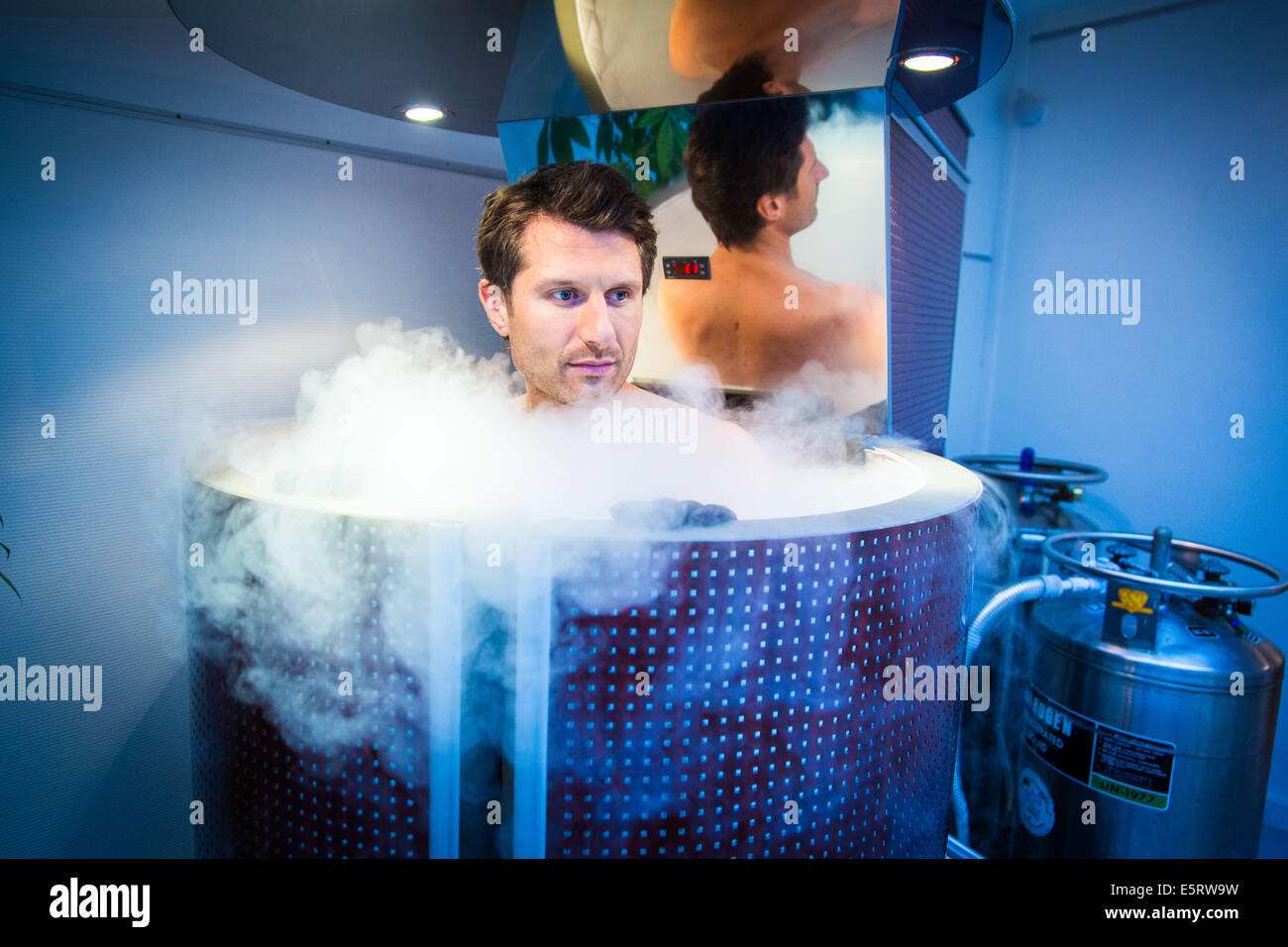 Man in a whole body cryotherapy cabine Stock Photo - Alamy
