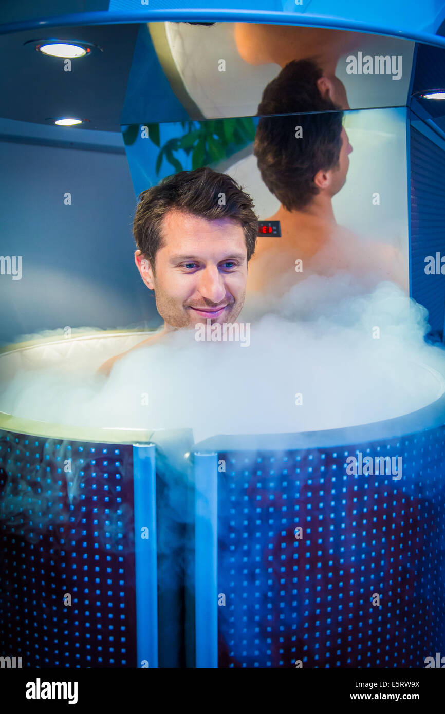 Man in a whole body cryotherapy cabine Stock Photo - Alamy