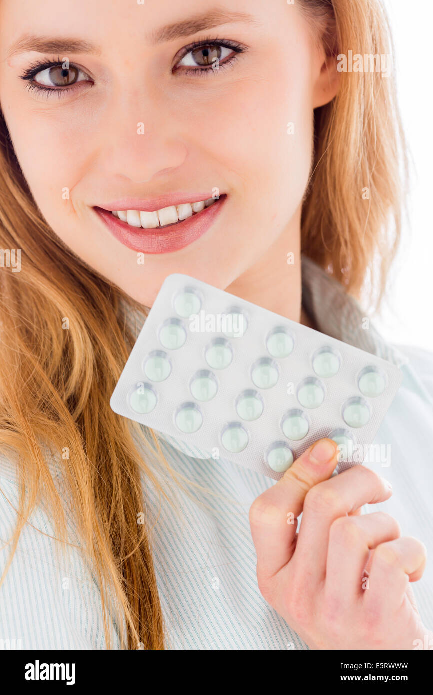 Woman holding tablets Stock Photo - Alamy