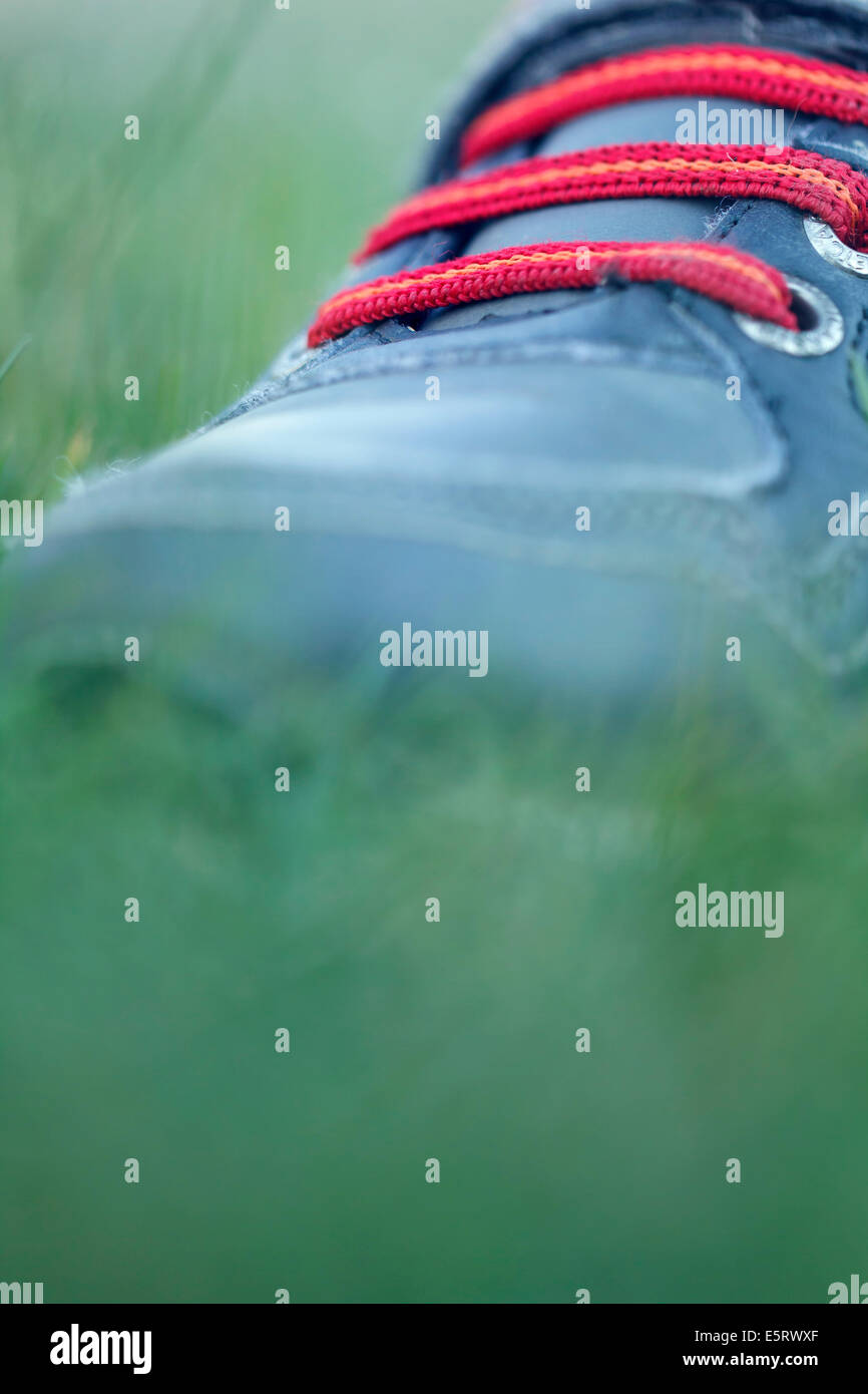Boot in grass, close up Stock Photo - Alamy