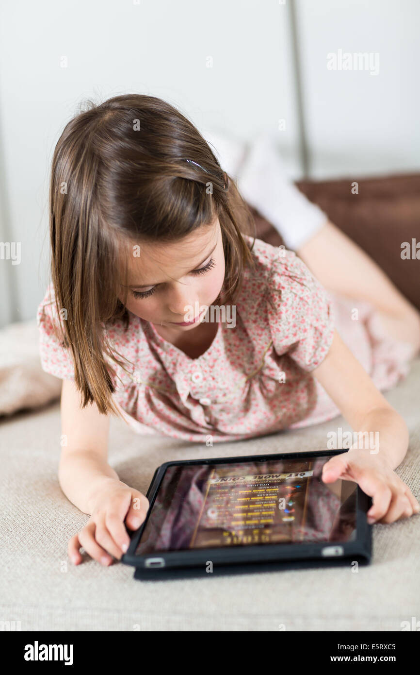 Kid With Ipad High Resolution Stock Photography and Images - Alamy