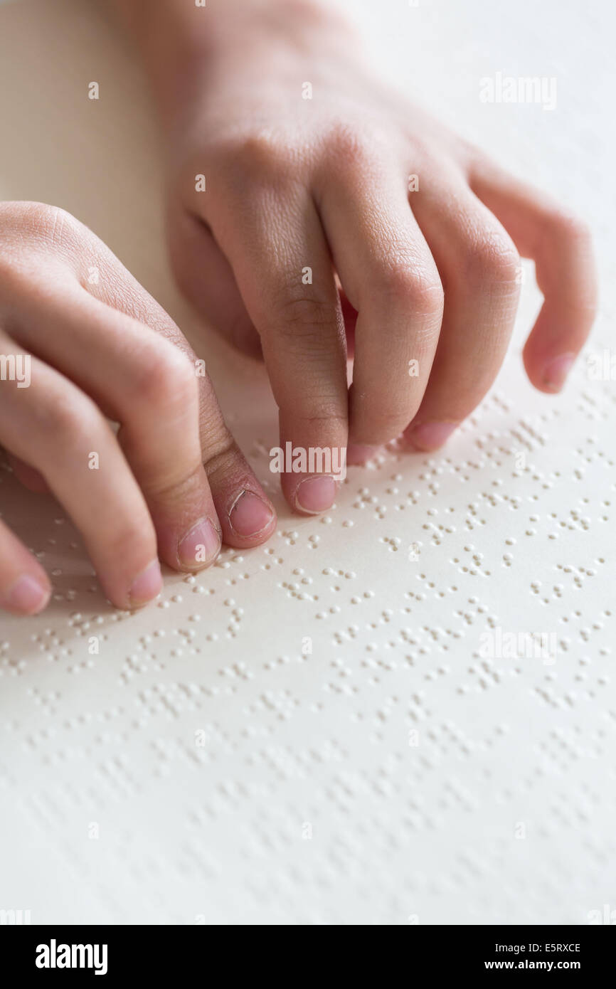 Child reading braille hi-res stock photography and images - Alamy