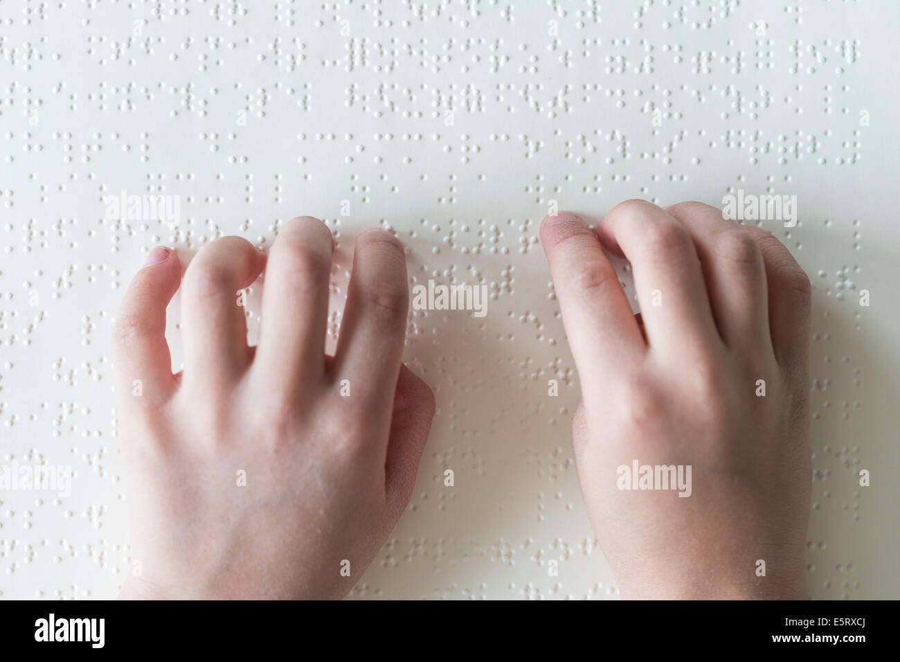 Child reading braille hi-res stock photography and images - Alamy