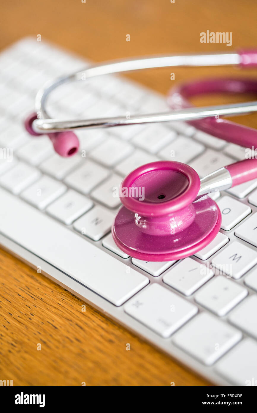 Stethoscope on a computer keyboard Stock Photo - Alamy