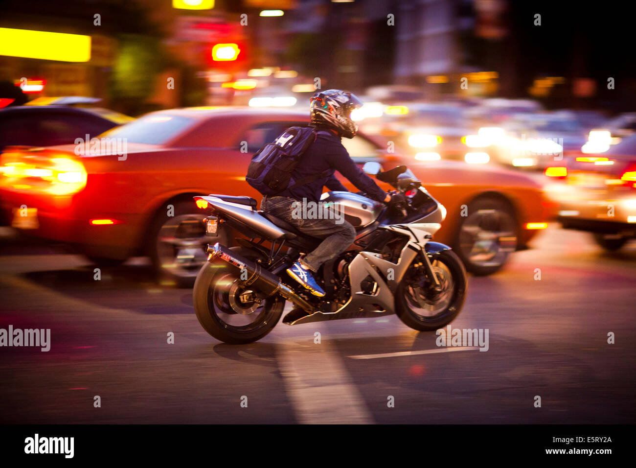 motorcycle in traffic, Hollywood Boulevard, Los Angeles, California ...