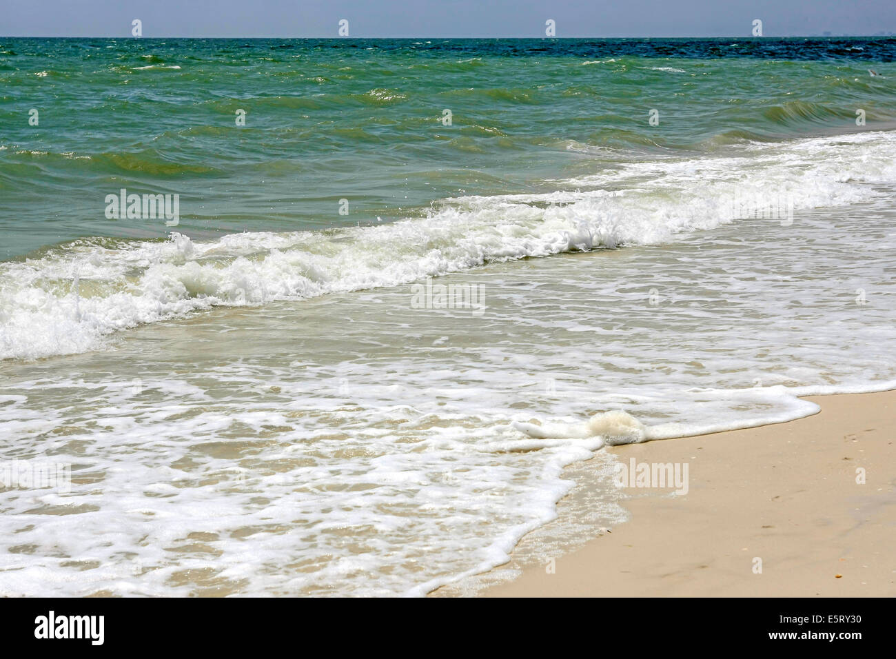 The waves lapping along the coastline at Bonita beach Florida Stock ...