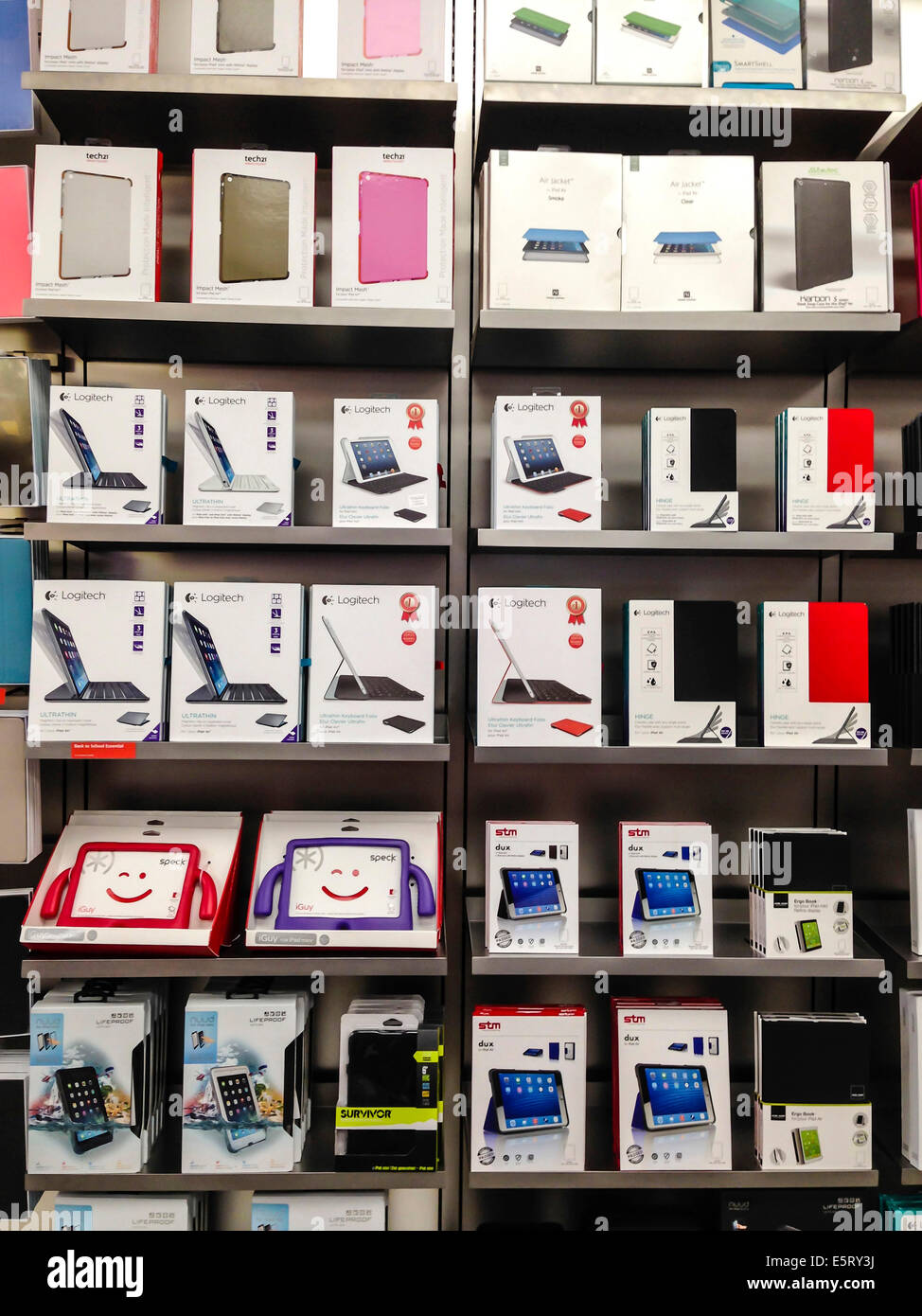 Products for all things Apple on display in the trendy Apple store in ...
