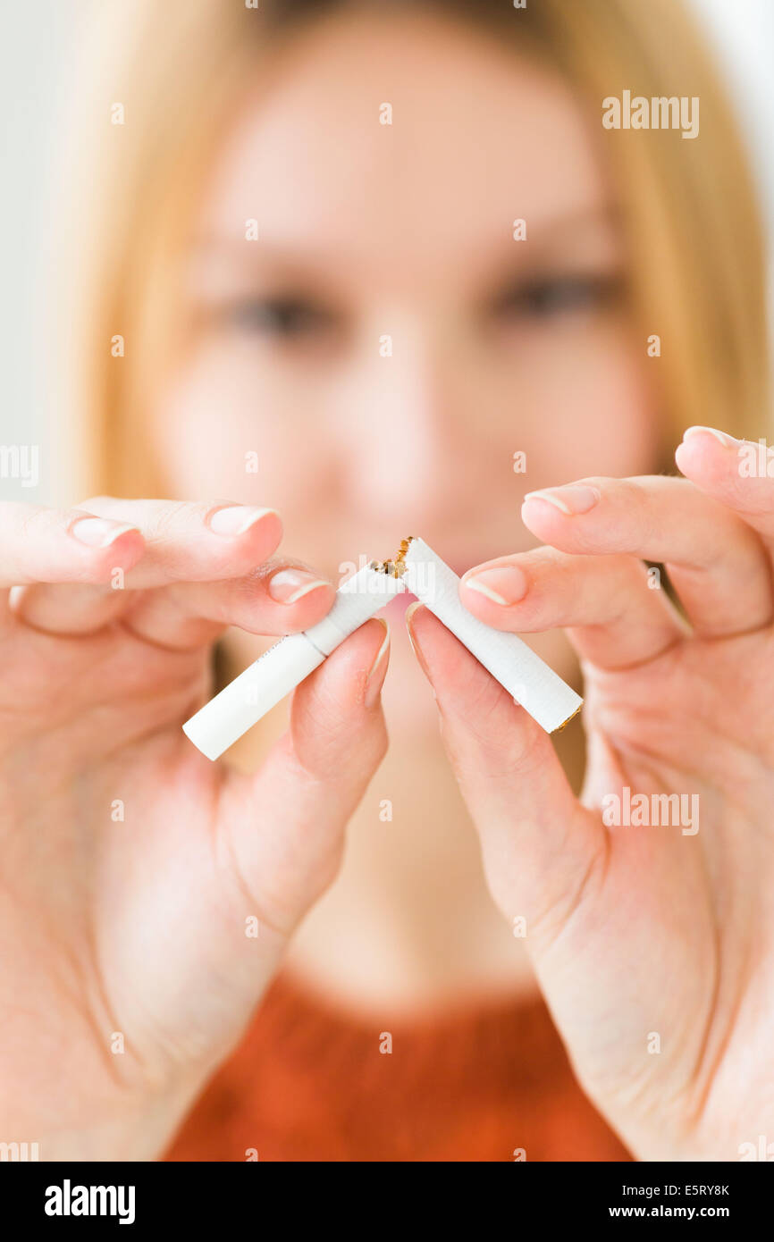 Snapping cigarette hi-res stock photography and images - Alamy
