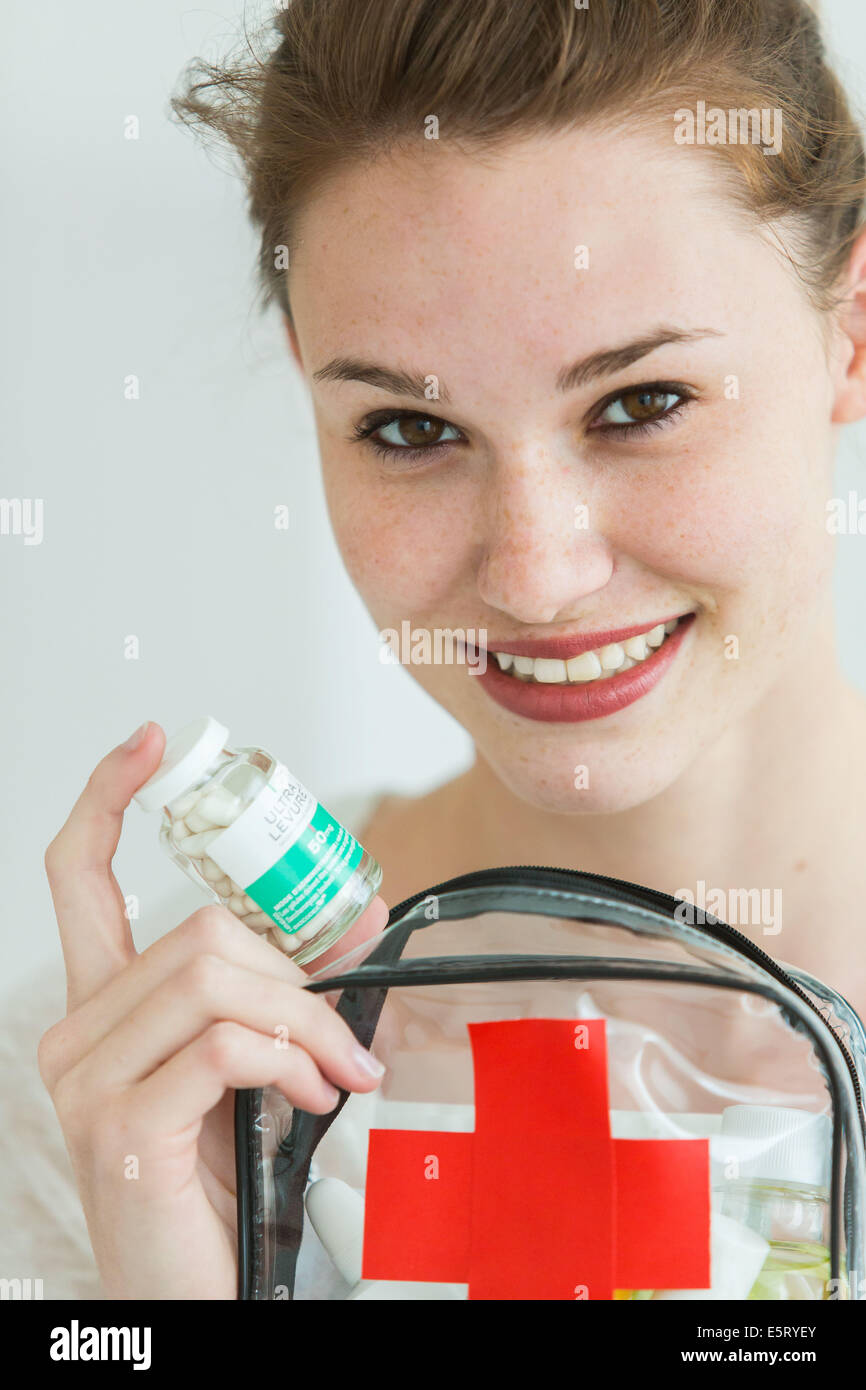 Woman first aid cabinet hi-res stock photography and images - Alamy