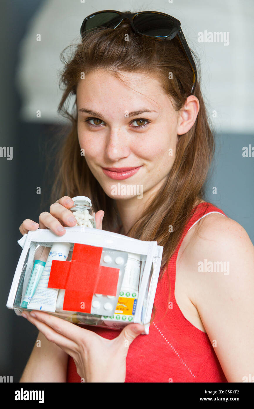 Woman first aid cabinet hi-res stock photography and images - Alamy