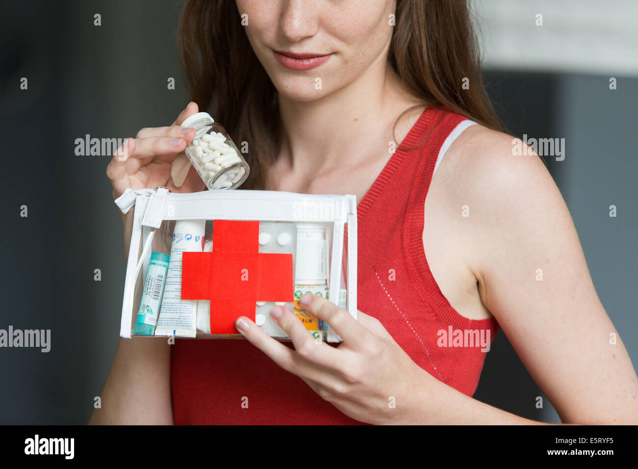 Woman first aid cabinet hi-res stock photography and images - Alamy