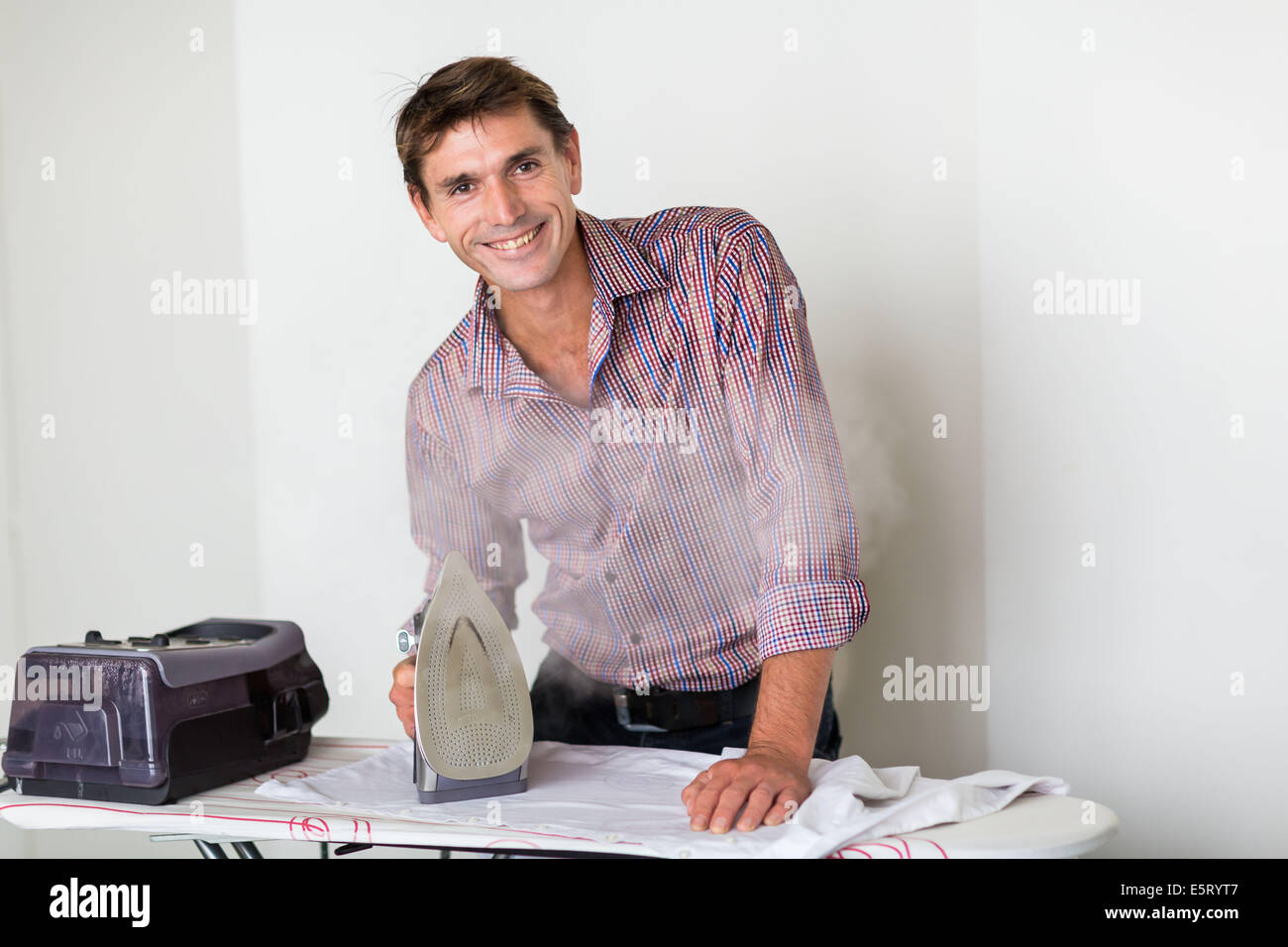 Steam iron hi-res stock photography and images - Alamy