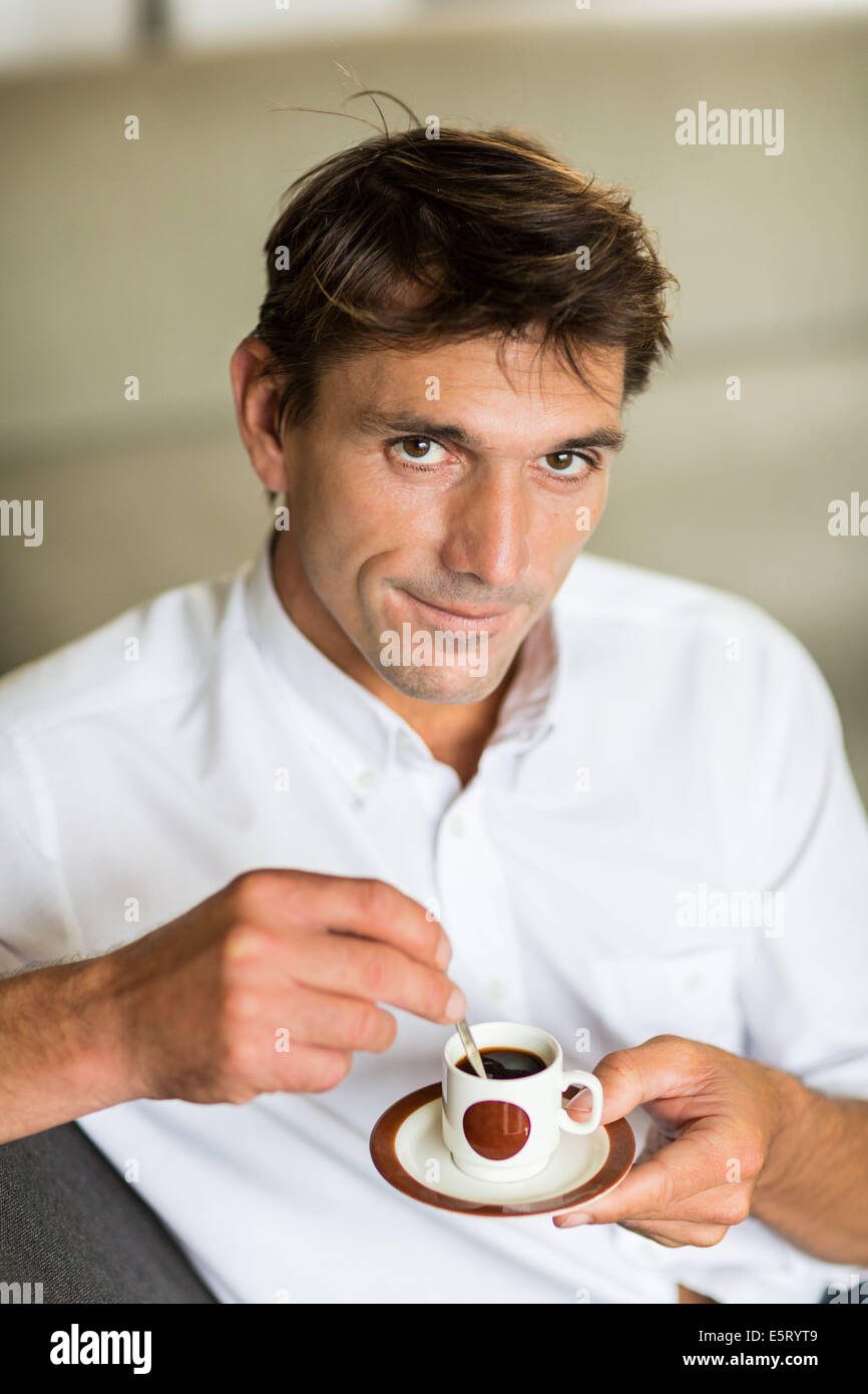 Man drinking coffee Stock Photo - Alamy