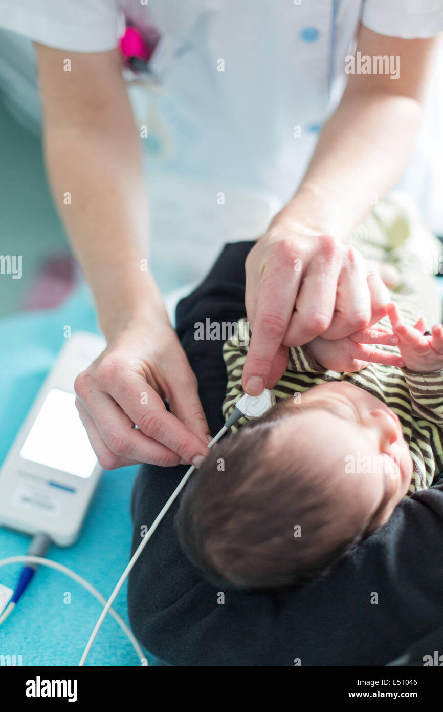 Newborn baby undergoing deafness screening test, Angoulême hospital ...