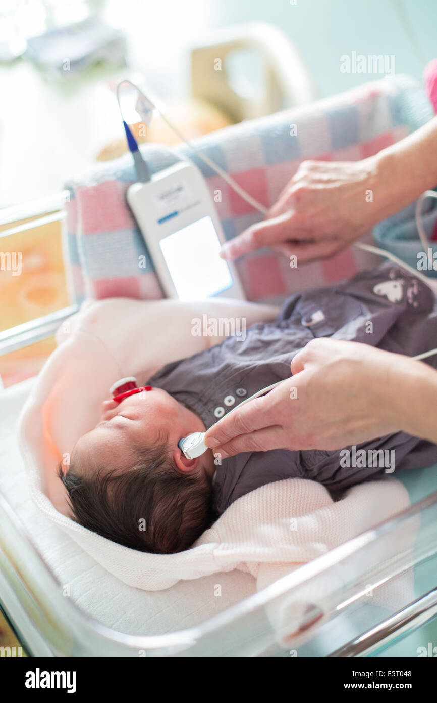 Newborn baby undergoing deafness screening test, Angoulême hospital ...