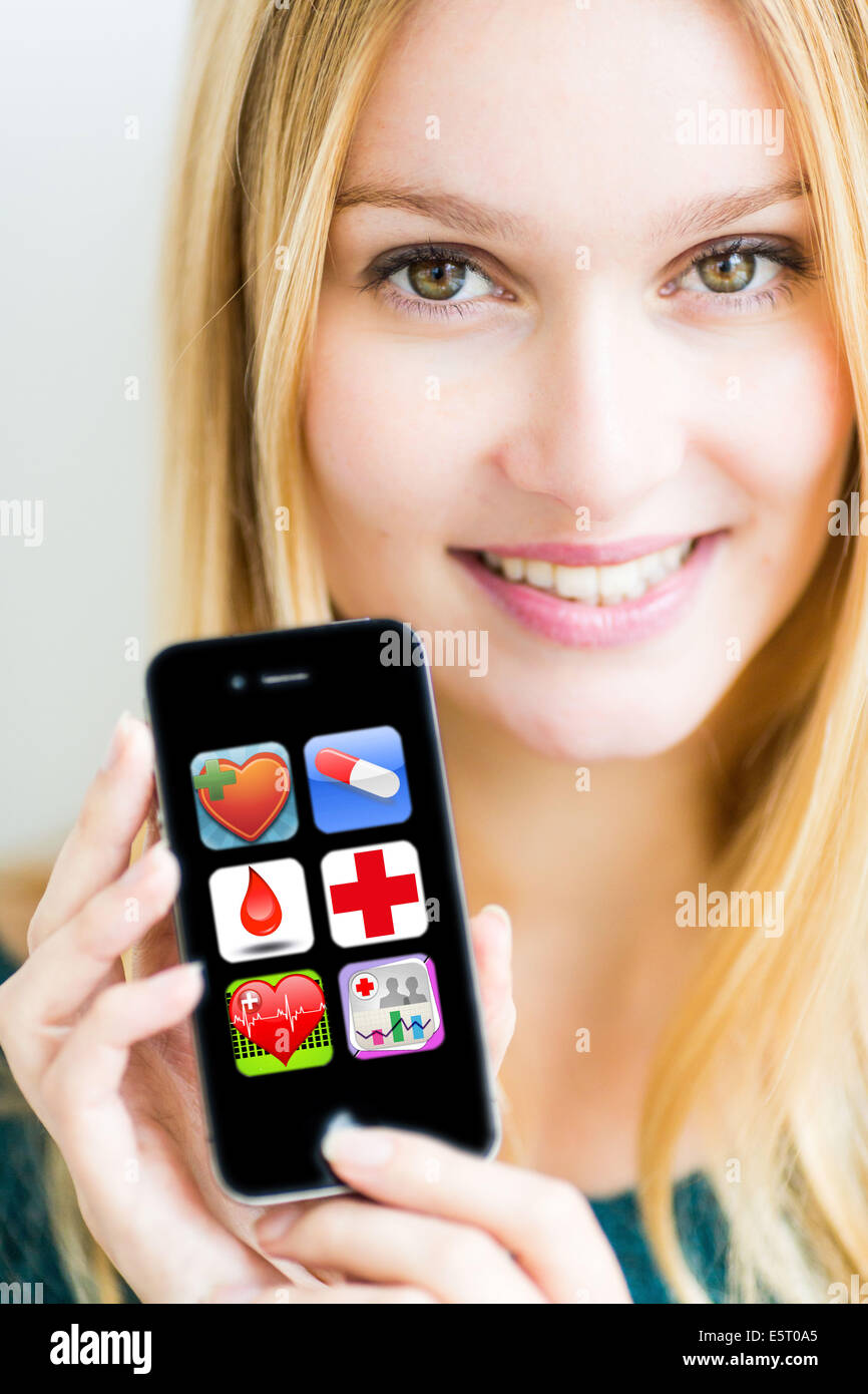 Woman using health application on her Iphone® Stock Photo - Alamy