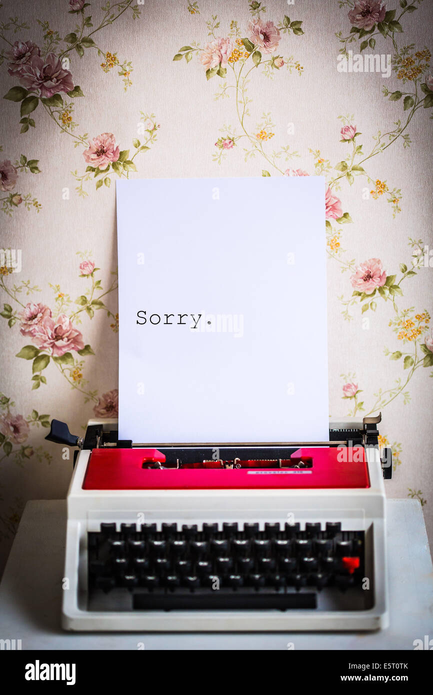 Word sorry written on a sheet of paper in a typewriter, Conceptual ...