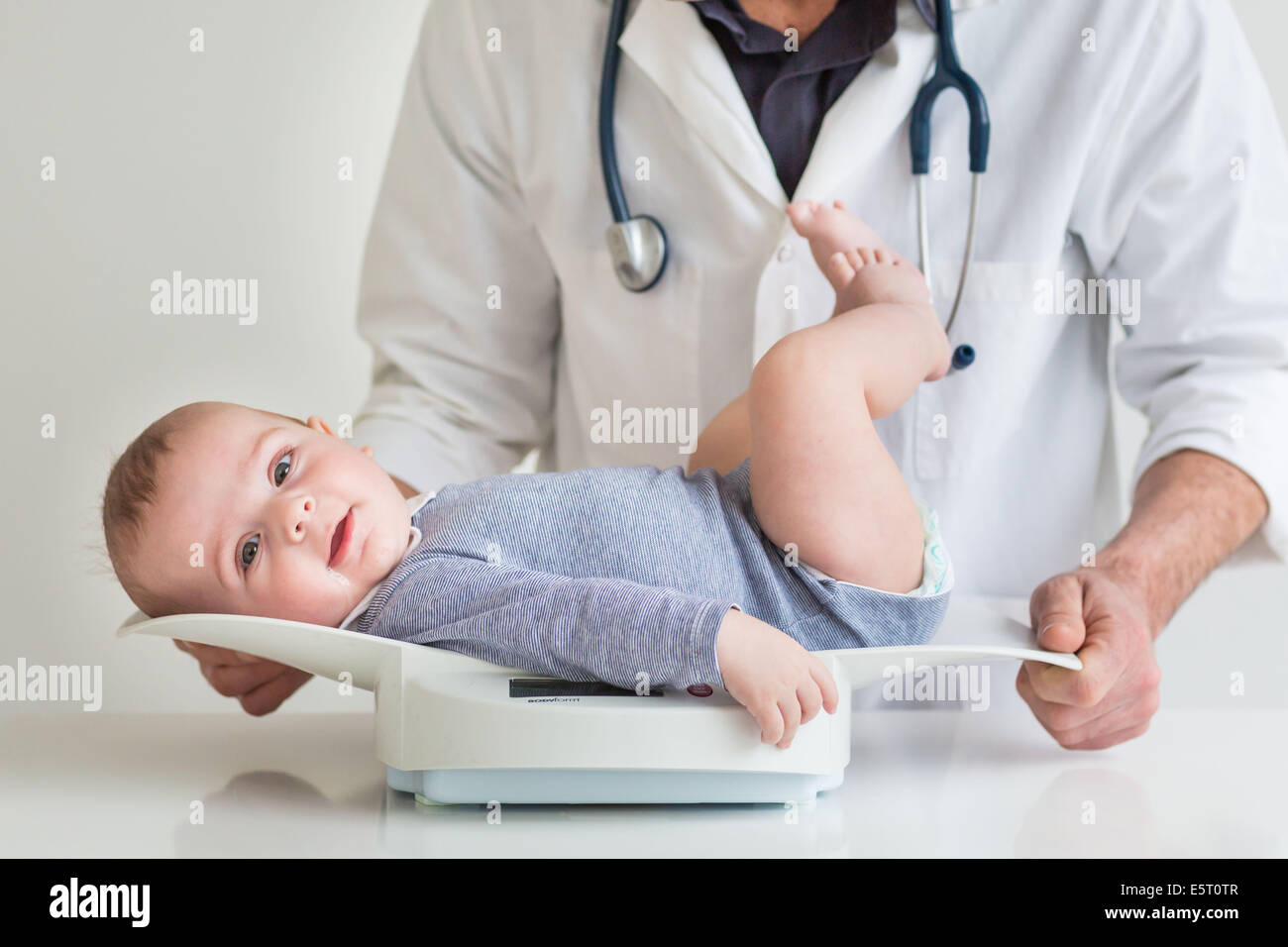 5 month old baby boy weighing Stock Photo - Alamy