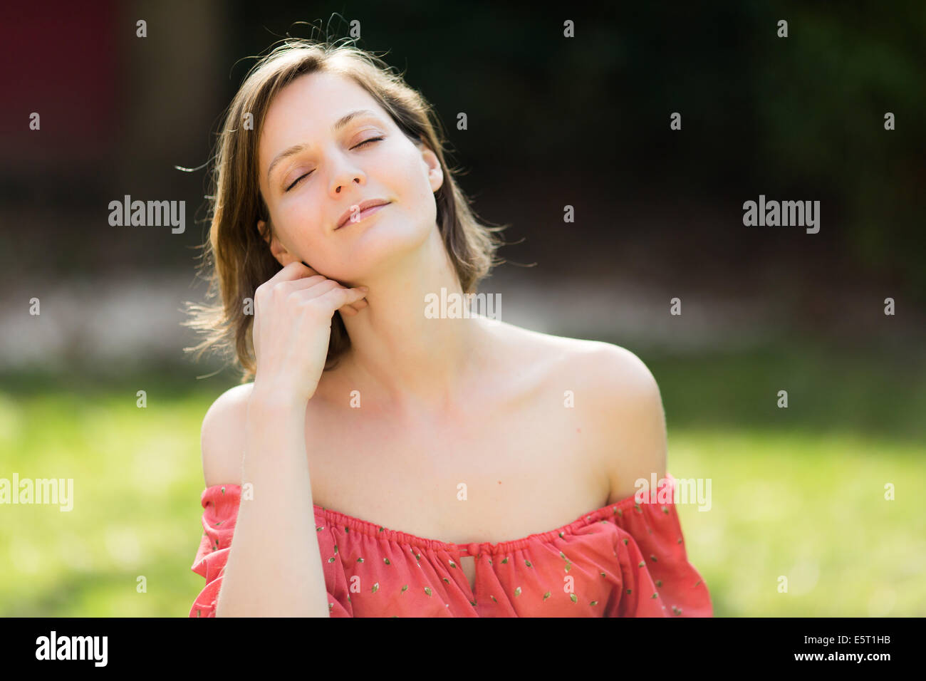 Spring woman sunbathing hi-res stock photography and images - Alamy