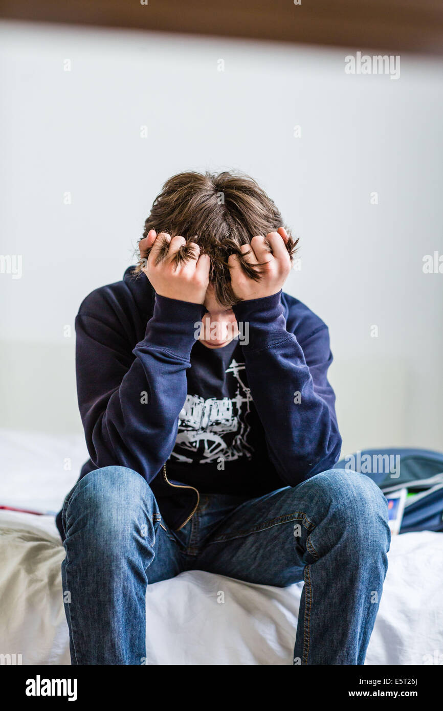 Depressed teenage boy Stock Photo - Alamy