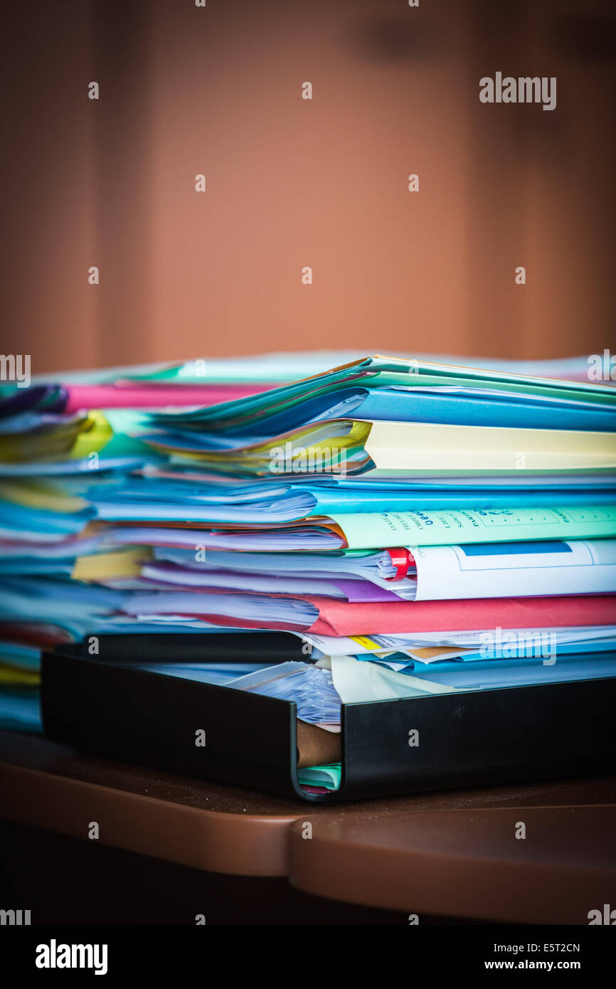 Files on a desk Stock Photo - Alamy