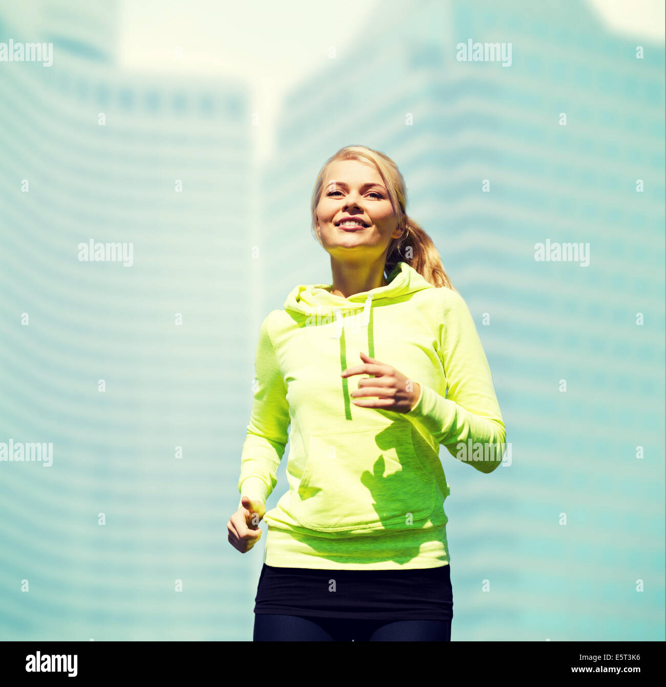 woman jogging outdoors Stock Photo - Alamy