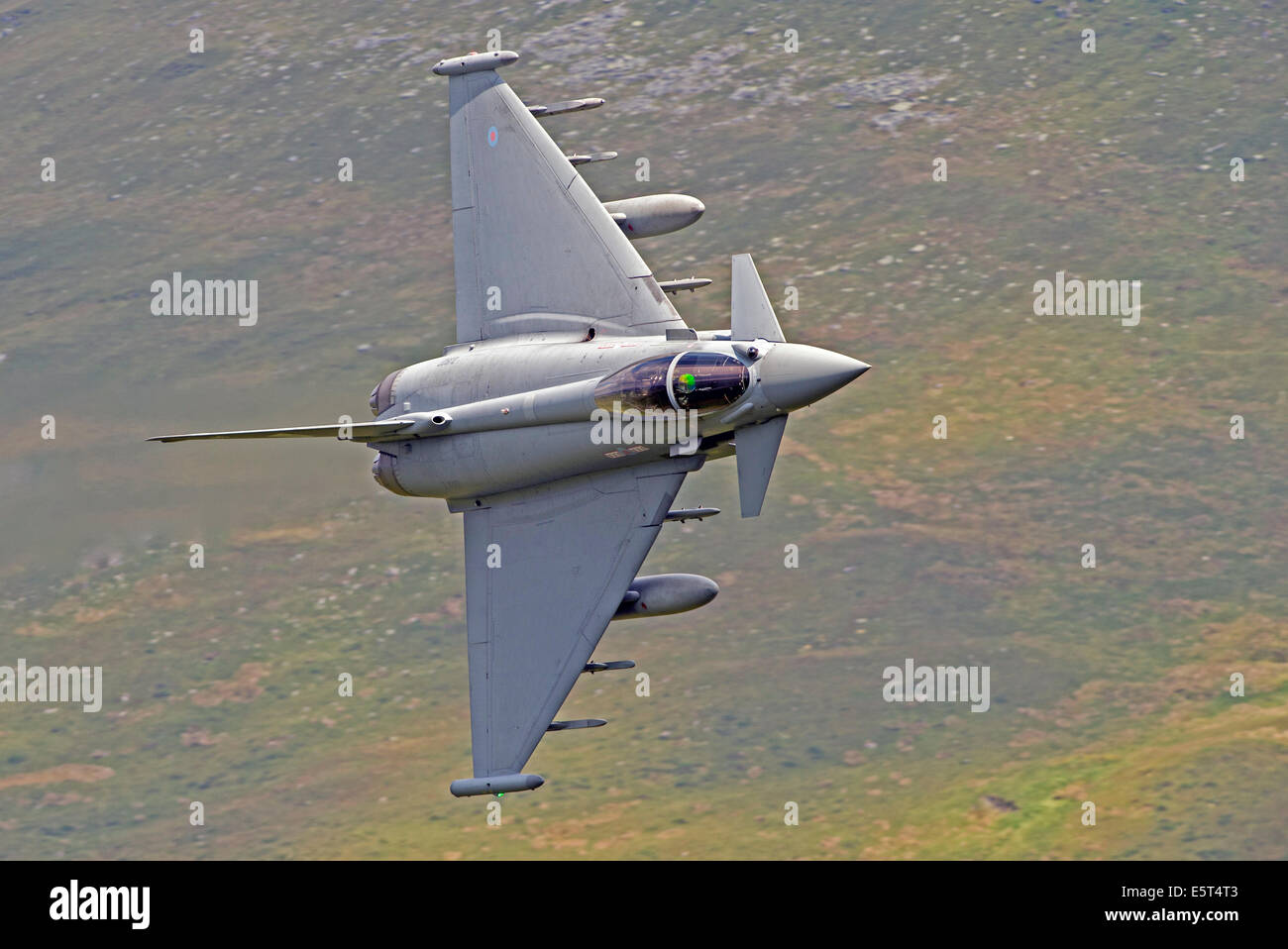RAF Typhoon (Eurofighter) flying low level in Wales Stock Photo - Alamy