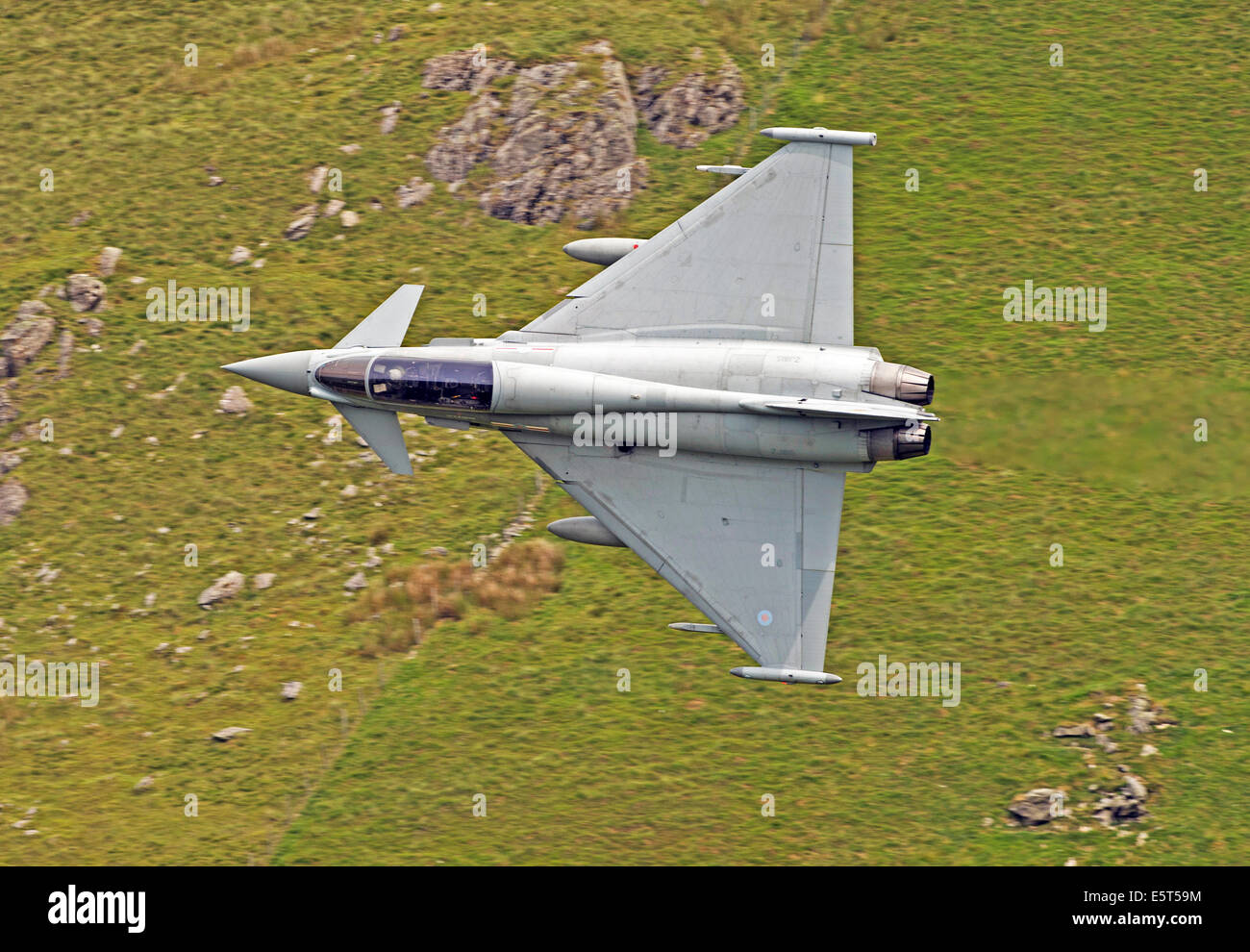 RAF Typhoon (Eurofighter) flying low level in Wales Stock Photo - Alamy
