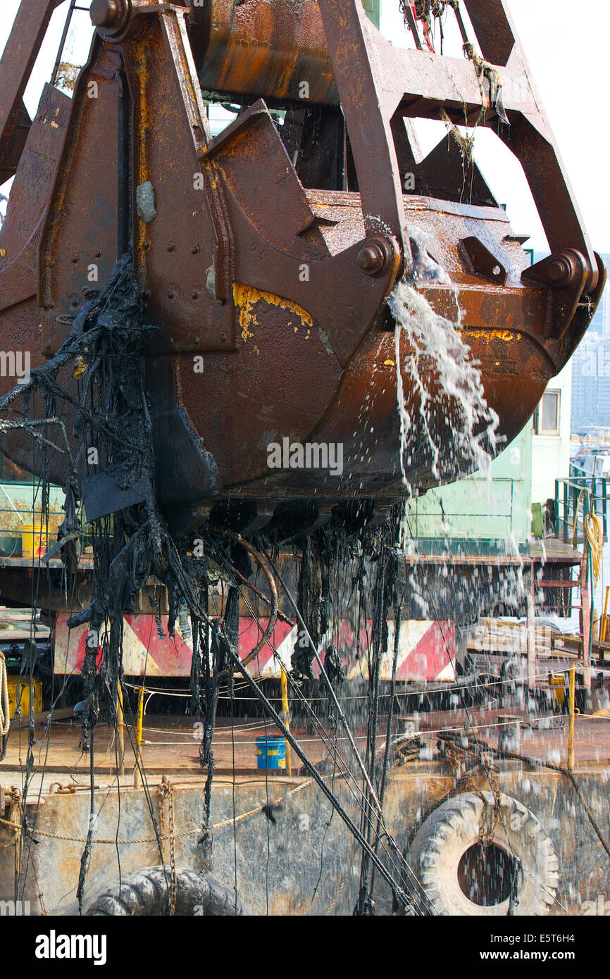 Scooping muck bucket hi-res stock photography and images - Alamy