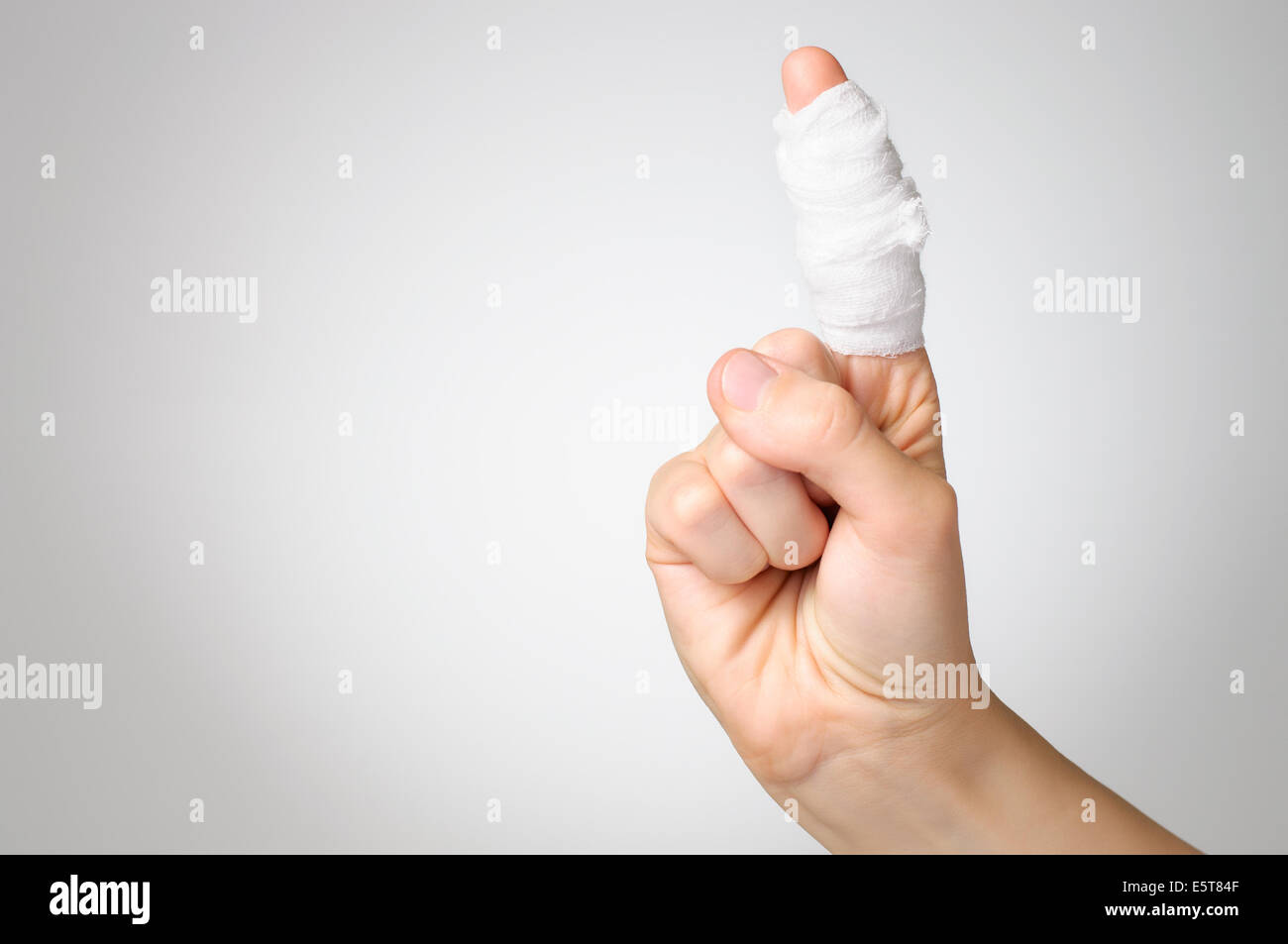 Injured finger with white gauze bandage Stock Photo - Alamy
