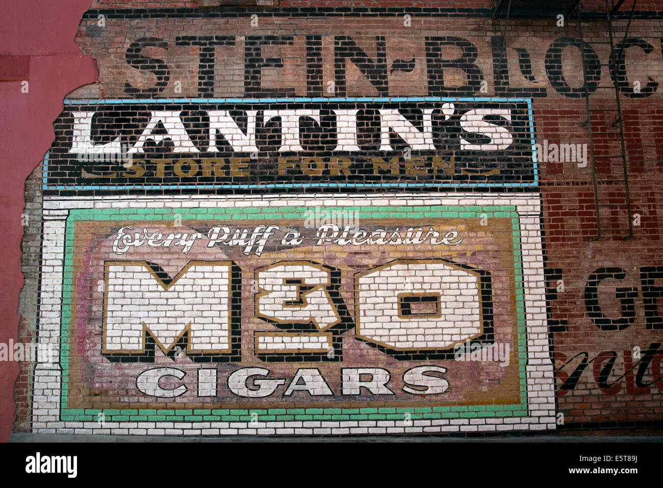 Old advertising sign painted on a brick wall in Globe, Arizona Stock ...