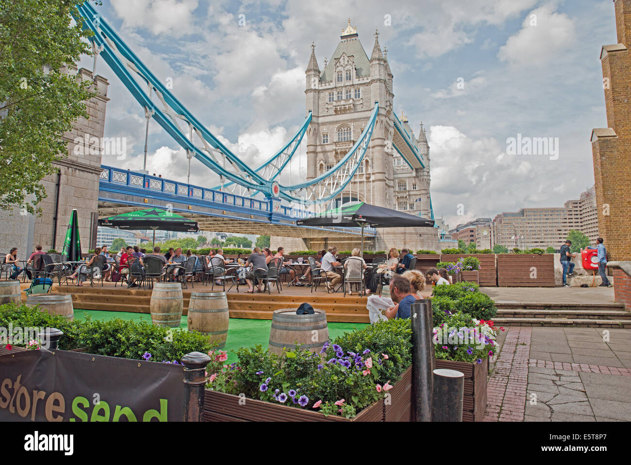 View of Tower Bridge With People in Gardens Photographed from Southwark ...