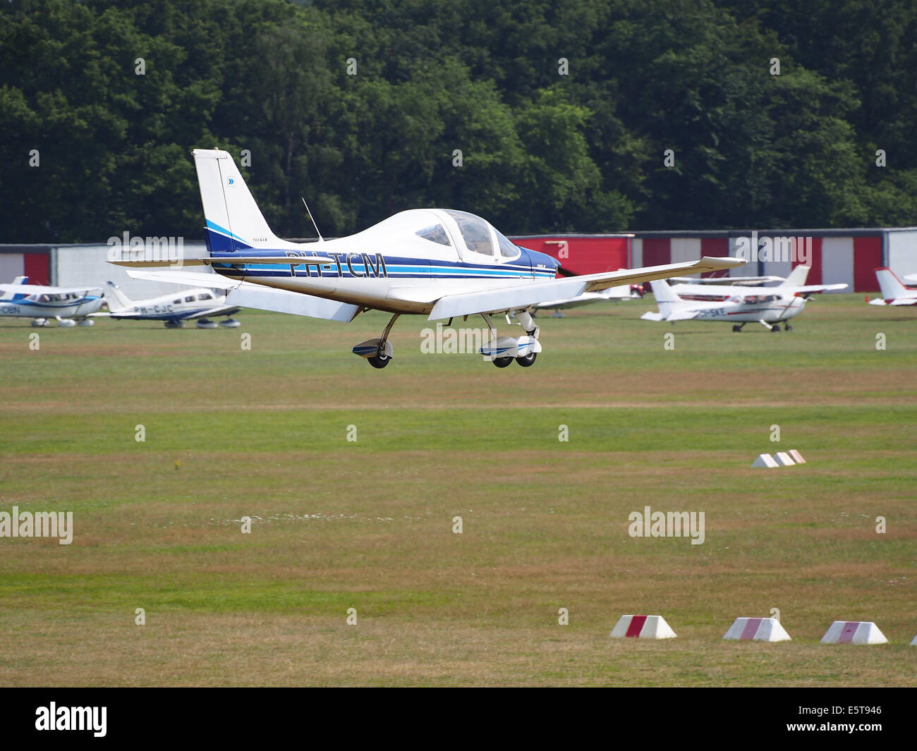 PH-TCM is a Tecnam P2002 Sierra light aircraft seen landing at ...