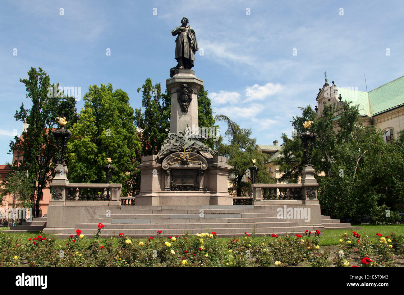 Adam Mickiewicz Monument in Warsaw which is next to the church of St ...