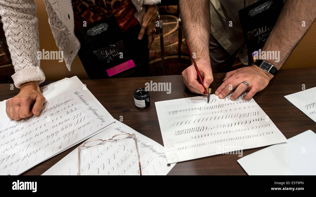 Indianapolis, Indiana, USA. 05th Aug, 2014. A teacher critiques a first ...