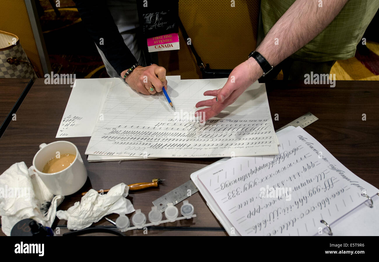 Indianapolis, Indiana, USA. 05th Aug, 2014. A teacher critiques a ...