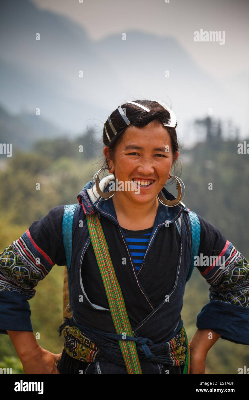 A Hmong lady dressing in traditional dress near the town of Sa Pa in ...