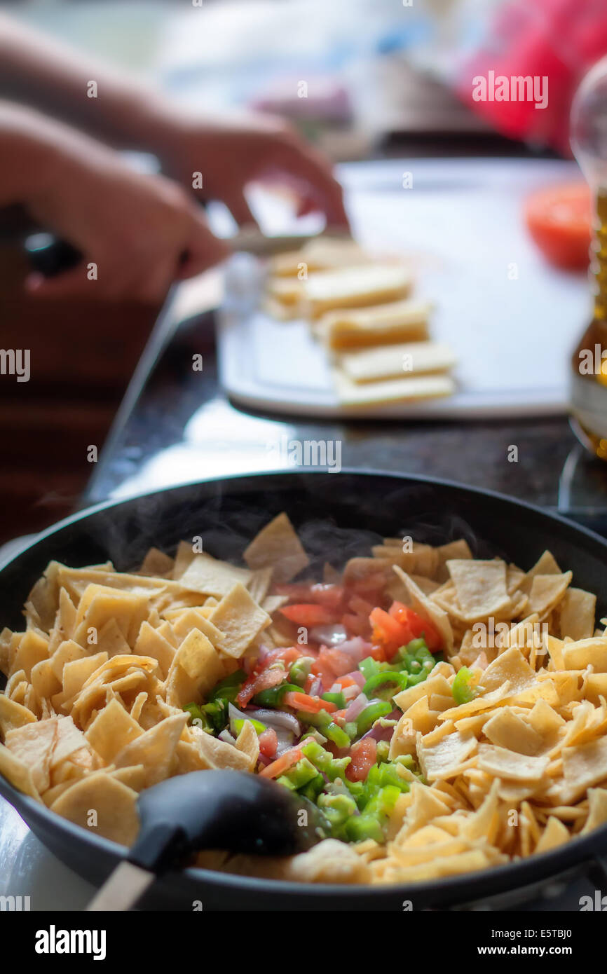 Cooking Chilaquiles, a traditional Mexican dish Stock Photo - Alamy