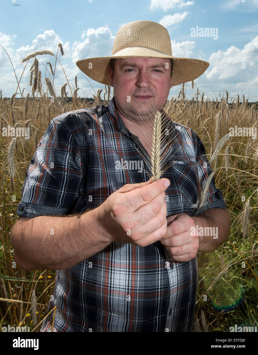 Amberg, Germany. 23rd July, 2014. Organic farmer Andreas Walz stands in ...