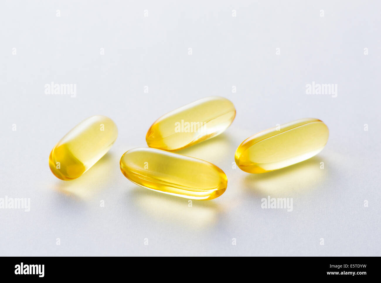 Yellow capsule hi-res stock photography and images - Alamy