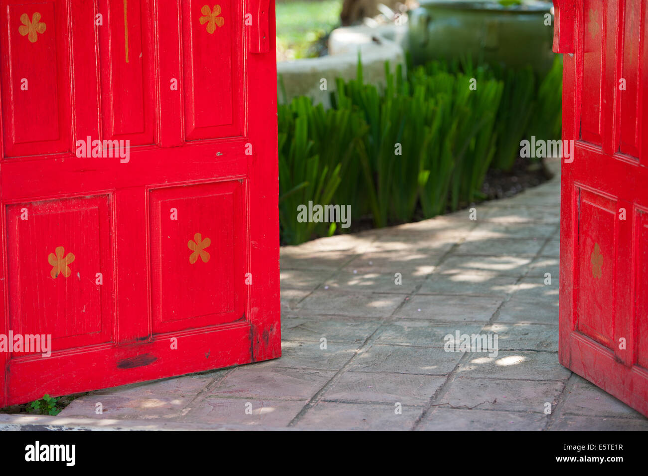 Red open door Stock Photo - Alamy