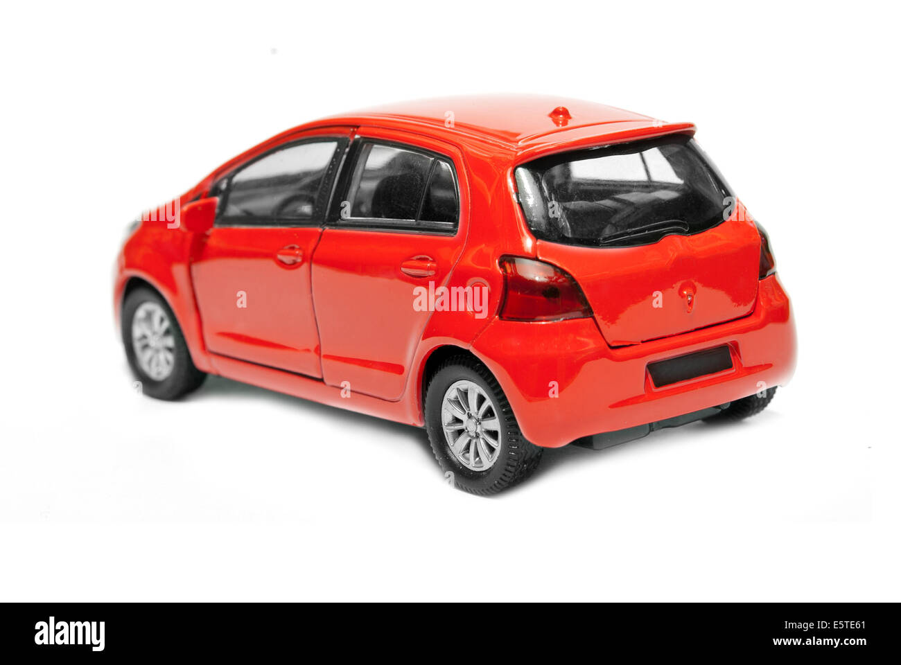 model of red car is isolated on a white background Stock Photo - Alamy